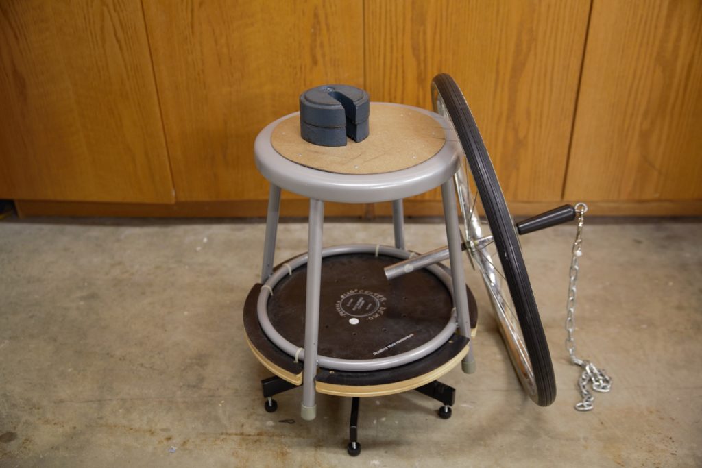 (1Q40.30) Rotating Stool with Bike Wheel and Weights – TAMU Physics Lab ...