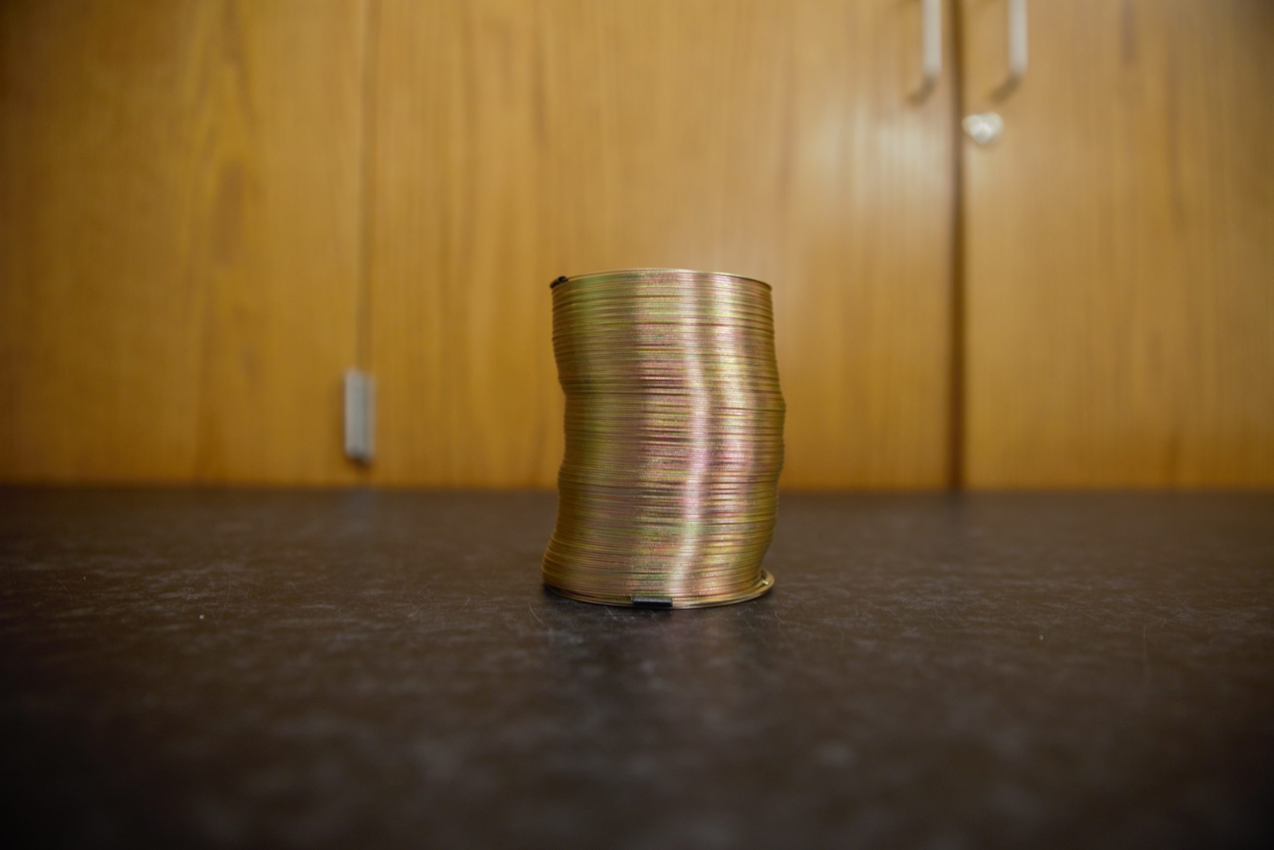 (3B10.20) Slinky on Table – TAMU Physics Lab Center